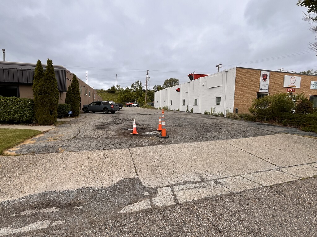 Please avoid the coned area in the parking area - Infrastructure ...